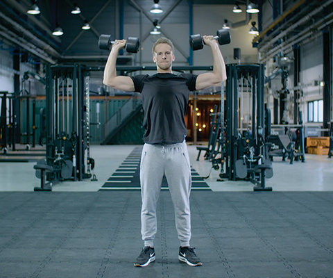 Dumbbell standing shoulder press - Changing Life